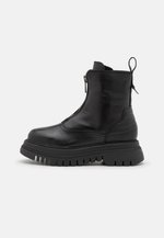 Buffalo SHADE ZIP MID - Platform ankle boots - black - Zalando.de