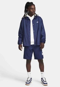 Nike Sportswear CLUB COACHES - Kevyt takki - midnight navy white ...
