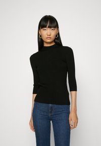 maje MANUCLOVER - Strickpullover - noir/schwarz - Zalando.at