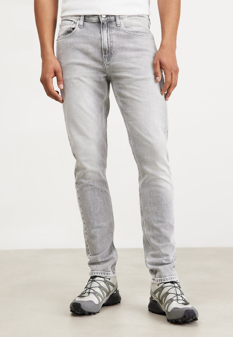 Calvin Klein Jeans SLIM TAPER - Slim fit jeans - denim grey/black denim ...