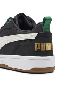Puma REBOUND V6 75 YEARS UNISEX - Edzőcipő - black warm white archive ...