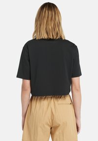 Timberland CROPPED - T-Shirt print - black/schwarz - Zalando.at