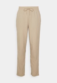 GAP TEXTURED RUNAROUND TAPER PANT - Tracksuit bottoms - warm golden ...