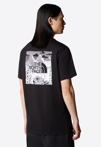 The North Face CELEBRATION - T-Shirt print - tnf black tnf white ...