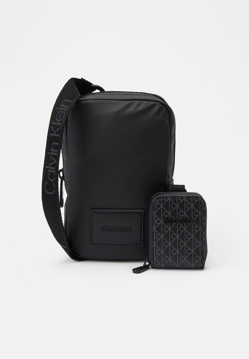 Calvin Klein PUFFER UTILITY PHONE CROSSBODY - Phone pouch - black ...