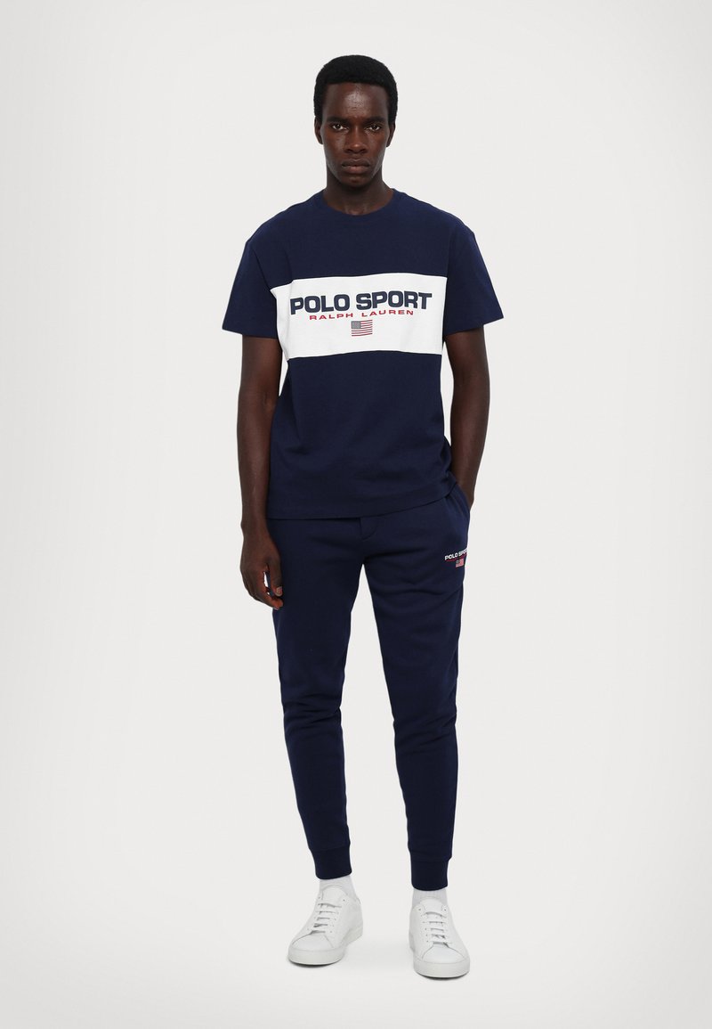 Polo Ralph Lauren ATHLETIC UNISEX - Tracksuit bottoms - cruise navy/white/dark blue - Zalando.co.uk