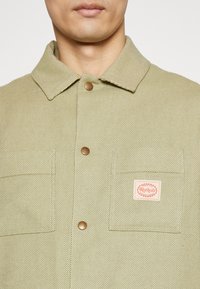 Rotholz LIGHT OVERJACKET UNISEX - Veste légère - green/vert - ZALANDO.CH