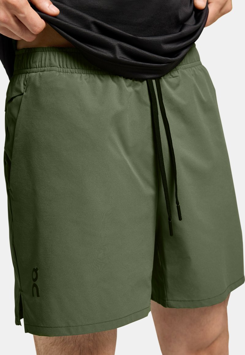 On ESSENTIAL - Sports shorts - taiga/green - Zalando.ie