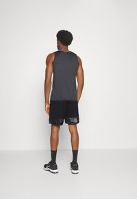 Nike Performance KNIT SHORT - Shorts - black/black/(coconut milk)/negro ...