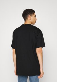 Calvin Klein Jeans ARCHIVAL MONOLOGO TEE - T-Shirt print - black/schwarz - Zalando.at