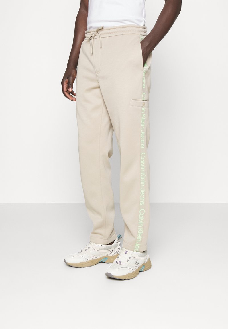 Calvin Klein Jeans Cut Off Logo Tape Pant Tracksuit Bottoms Plaza