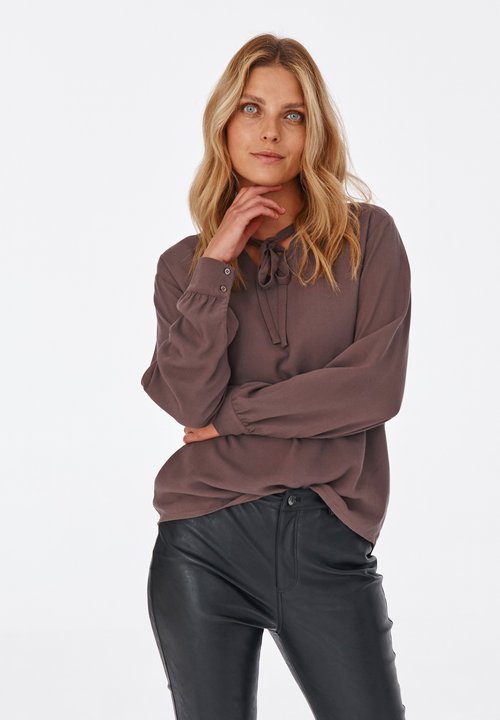 Avasta Tuunikad ja pluusid naistele veebis | ZALANDO