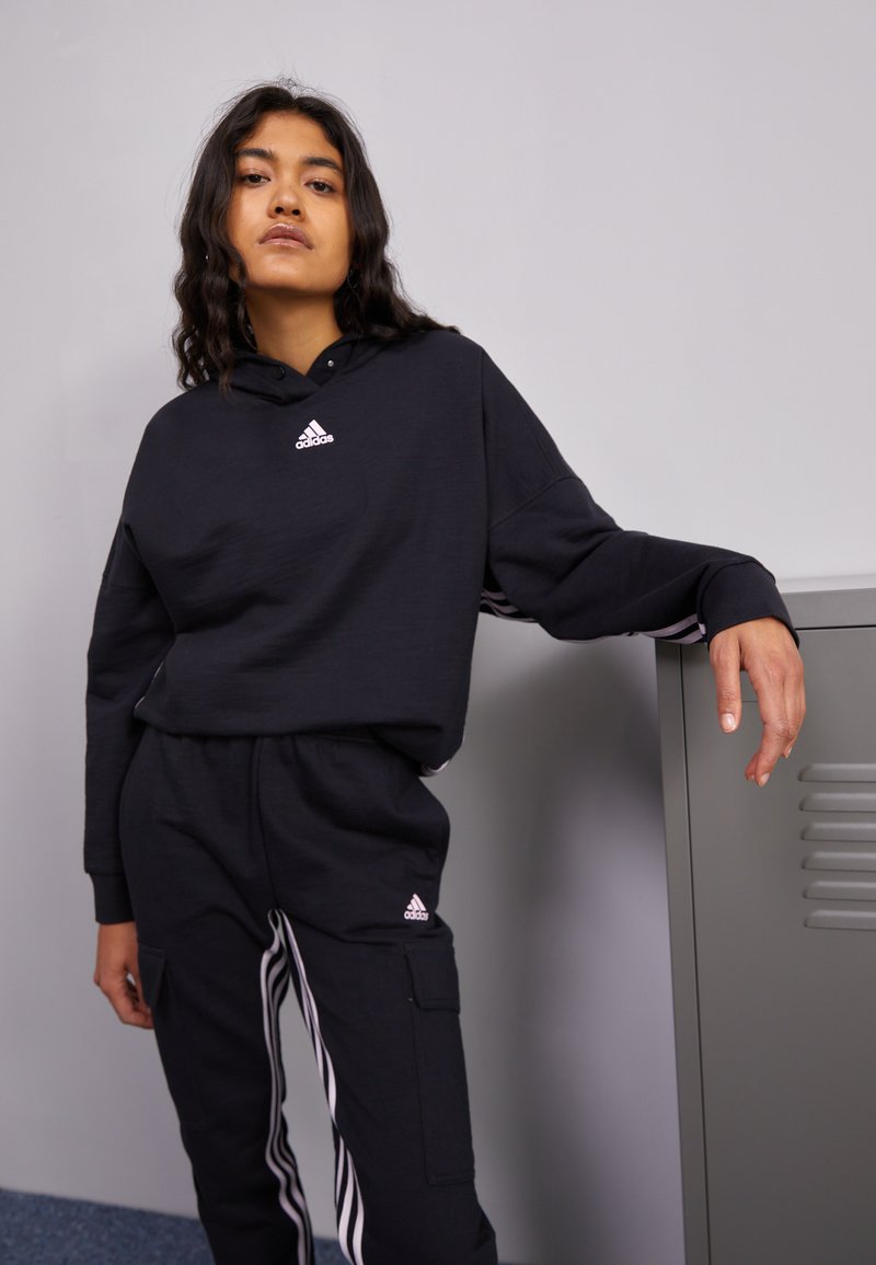 adidas Sportswear DANCE - Sweatshirt - black/clear pink/black - Zalando.de