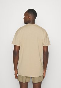 SQUATWOLF ESSENTIALS OVERSIZED FIT - T-Shirt basic - sand/beige - Zalando.de