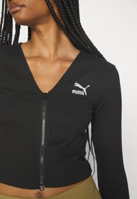 Puma CLASSICS LONG SLEEVE V NECK - Cardigan - black/svart - Zalando.no
