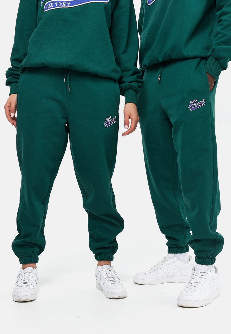 Karl Kani VARSITY CUFFED PANTS UNISEX - Träningsbyxor - dark green ...