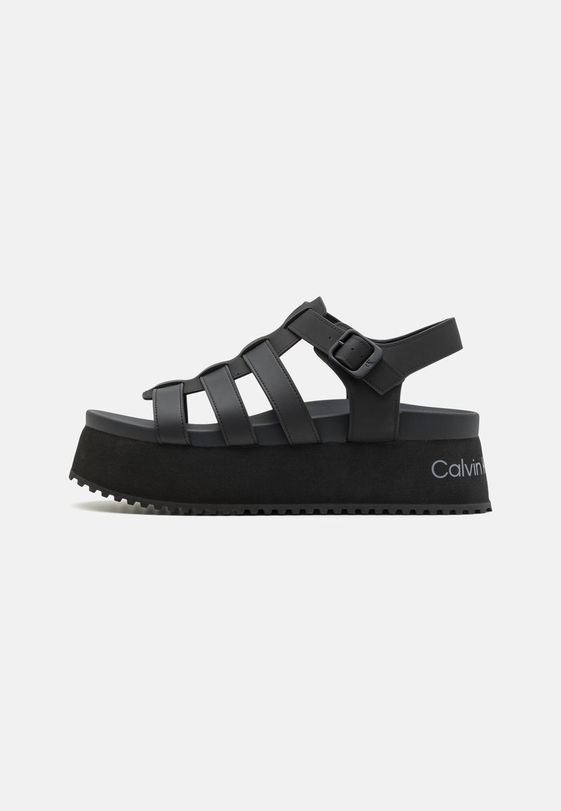 Calvin Klein Jeans PLATFORM BUCKLE - Platform sandals - triple black ...