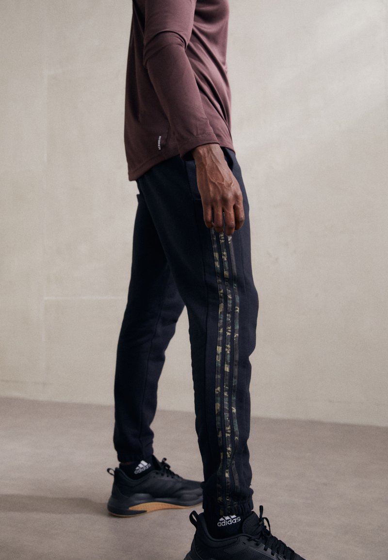 adidas Sportswear Spodnie treningowe/czarny - Zalando.pl