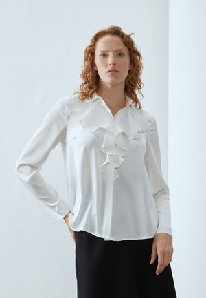Chemises et chemisiers col à jabot pour femme | Zalando