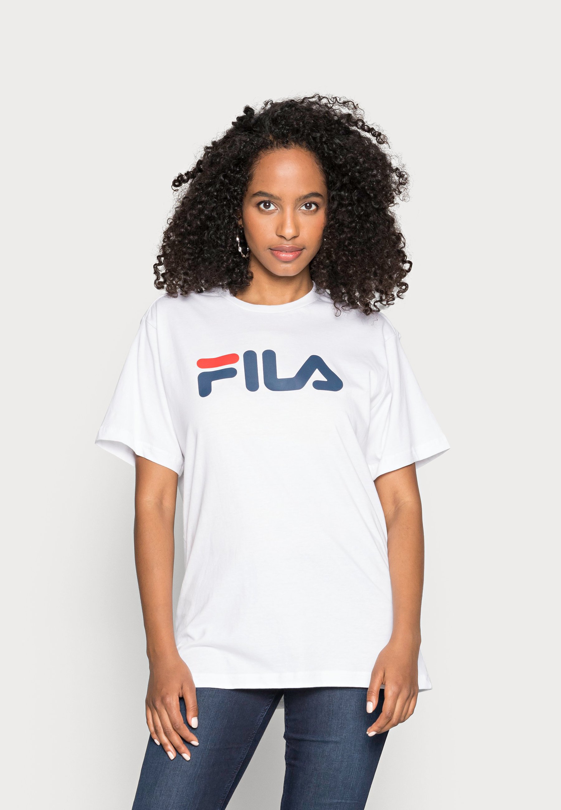 White fila shirt store