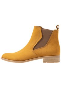 Marco Tozzi Nilkkurit - mustard yellow/sinapinkeltainen - (Pre-owned ...