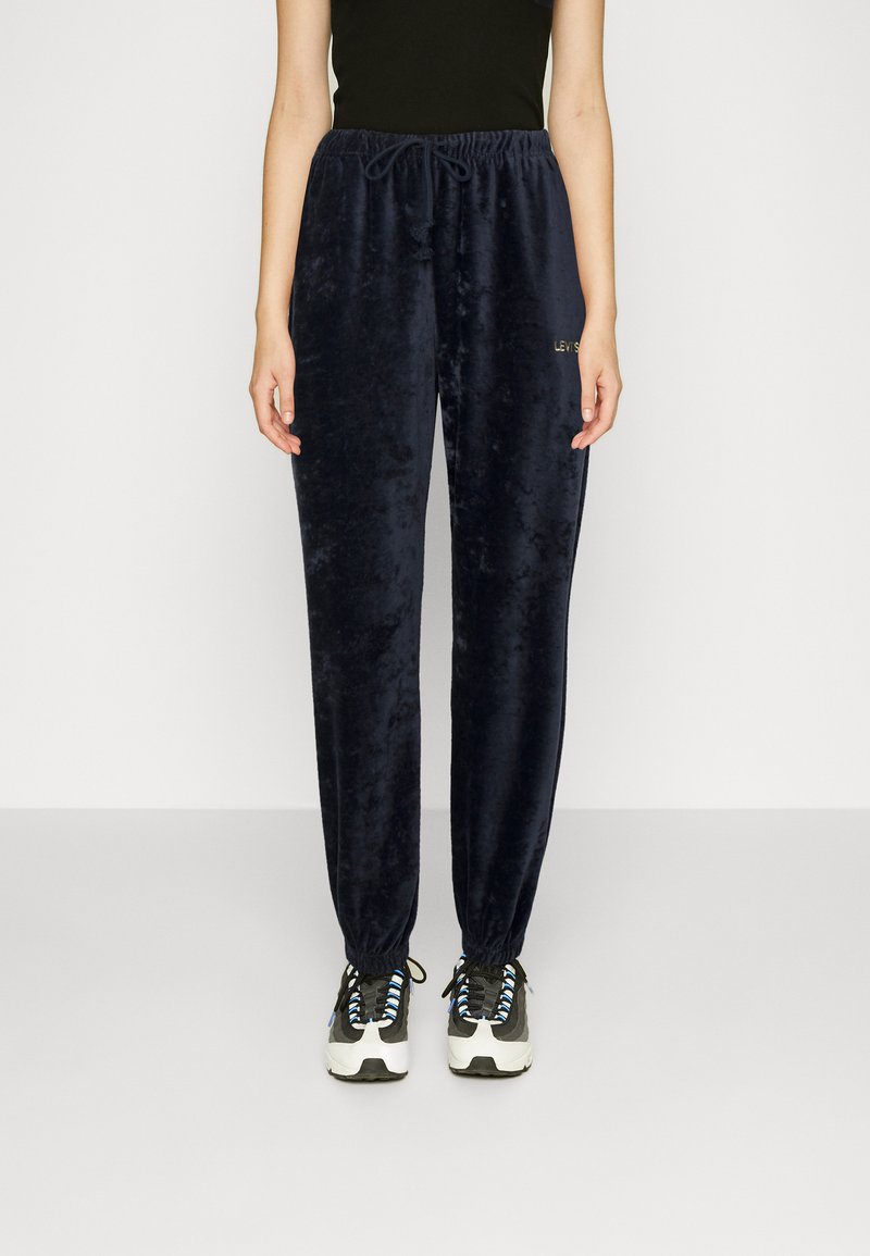 Levi's® GRAPHIC LAUNDRY - Tracksuit bottoms - total eclipse/dark blue ...