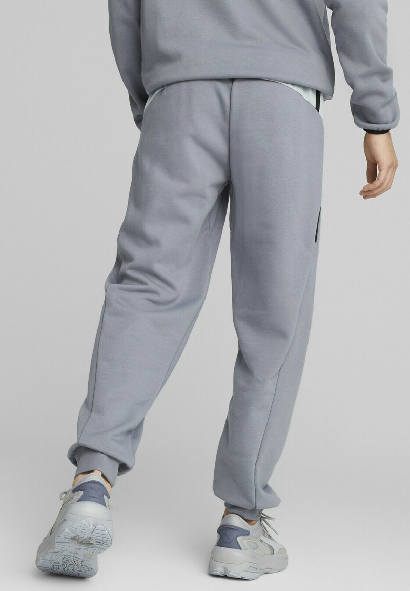 Puma TECH - Spodnie treningowe/szary - Zalando.pl
