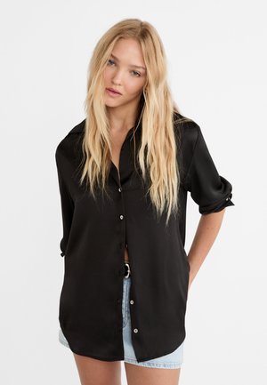 Sorte bluser & skjorter til dame | Zalando