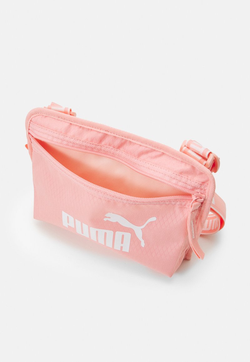 Puma CORE BASE SHOULDER BAG - Across body bag - peach smoothie/pink ...