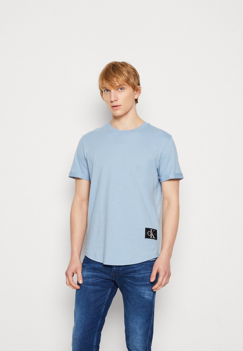 Calvin Klein Jeans Badge Turn Up Sleeve T Shirt Print Iceland Blue
