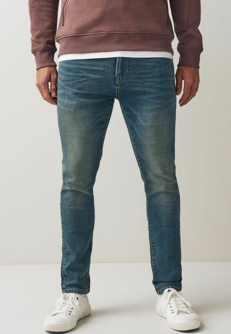 Next SUPER STRETCH COMFORT - Jeans Slim Fit - green/grün - Zalando.at