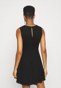 TFNC SOREAN MINI - Robe de soirée - black/noir - ZALANDO.CH