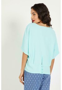 SINTY AJUSTADA EN LA CINTURA CON LAZO DECORATIVO - Blusa - verde ...