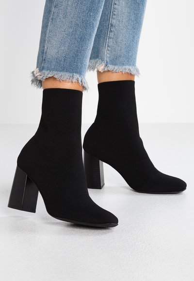 Bottes à talon en ligne | Zalando