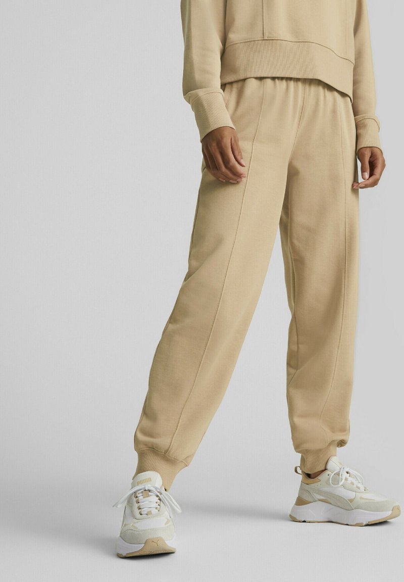 Puma HER HIGH WAIST TR - Tracksuit bottoms - dusty tan/beige - Zalando
