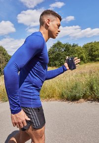 adidas Performance RUN HANDY CASE - Handyhülle - black/schwarz - Zalando.de