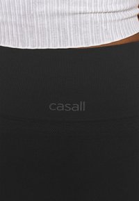 Casall ESSENTIAL BLOCK SEAMLESS HIGH WAIST - Tights - black/schwarz - Zalando.de