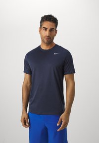 Nike Performance TEE RESET - Sports T-shirt - dark obsidian/dark blue ...