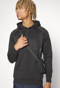 Puma TECH FL - Jersey con capucha - black/negro - Zalando.es