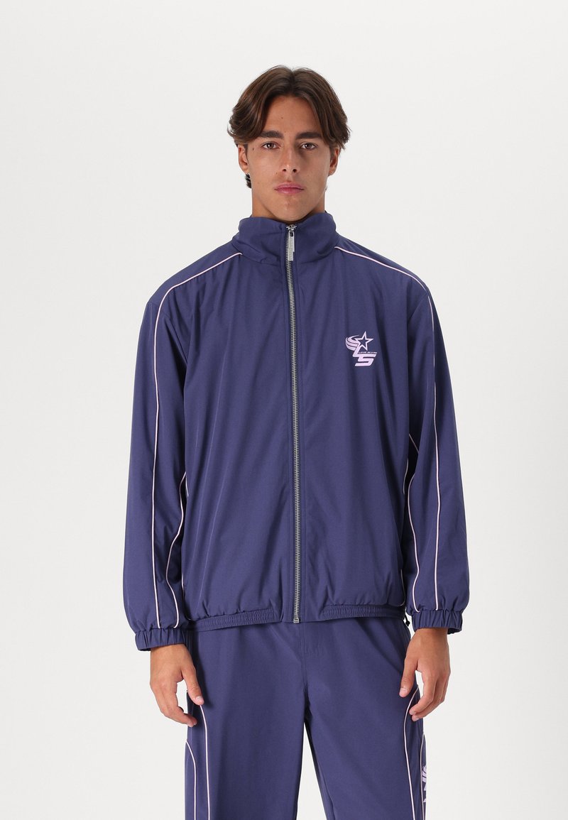 Love Scars COACH TRACK JACKET UNISEX - Välikausitakki - midnight purple ...