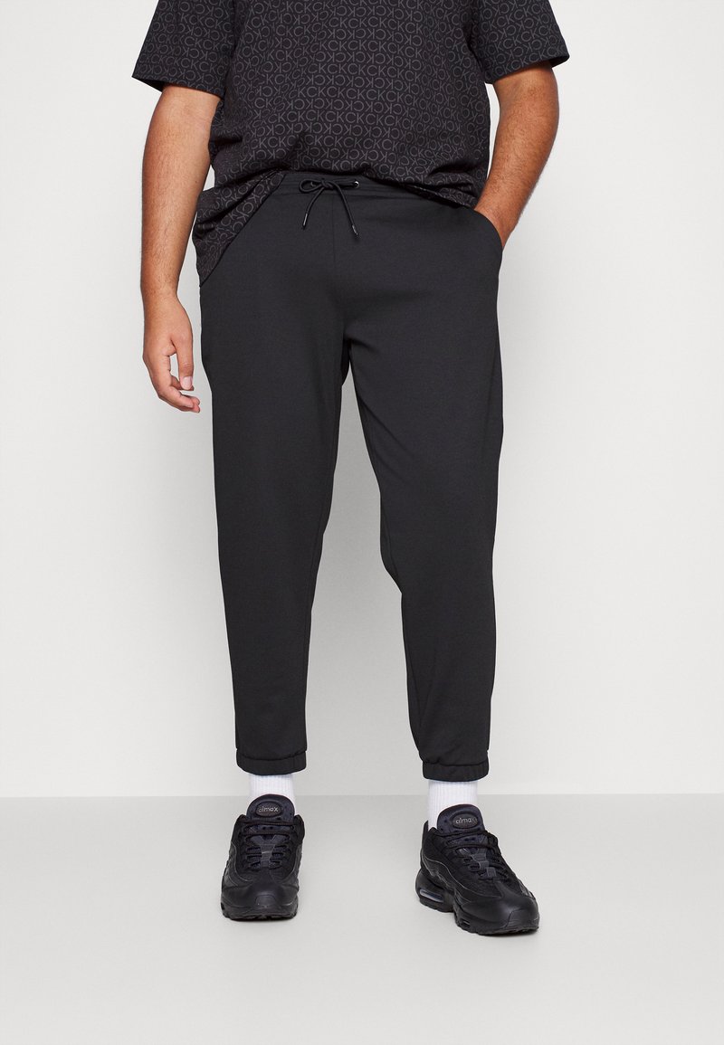 Calvin Klein Comfort Logo Tape Pant Jogginghose Black Schwarz