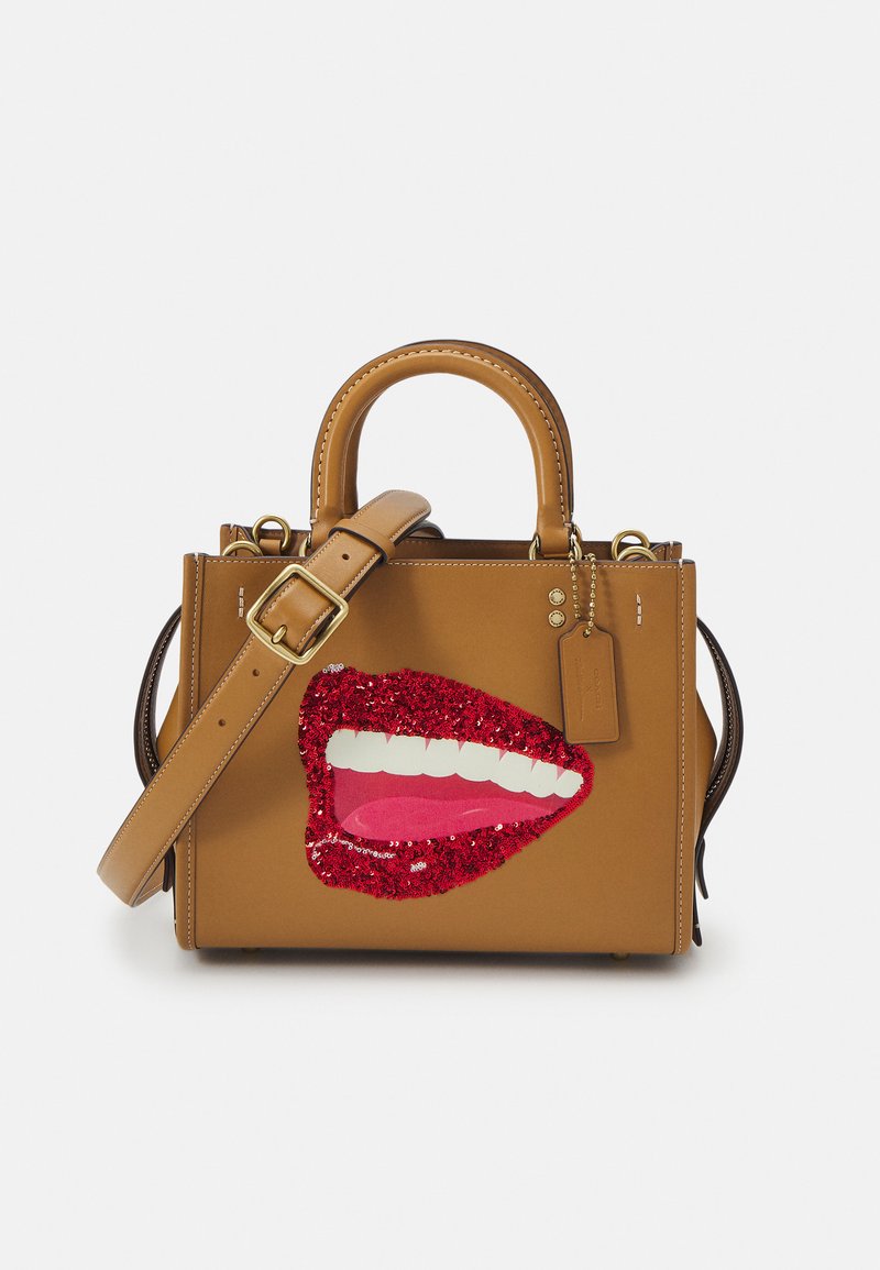 Coach TOM WESSELMANN SMILE ROGUE BAG - Handtas - light camel/camel ...