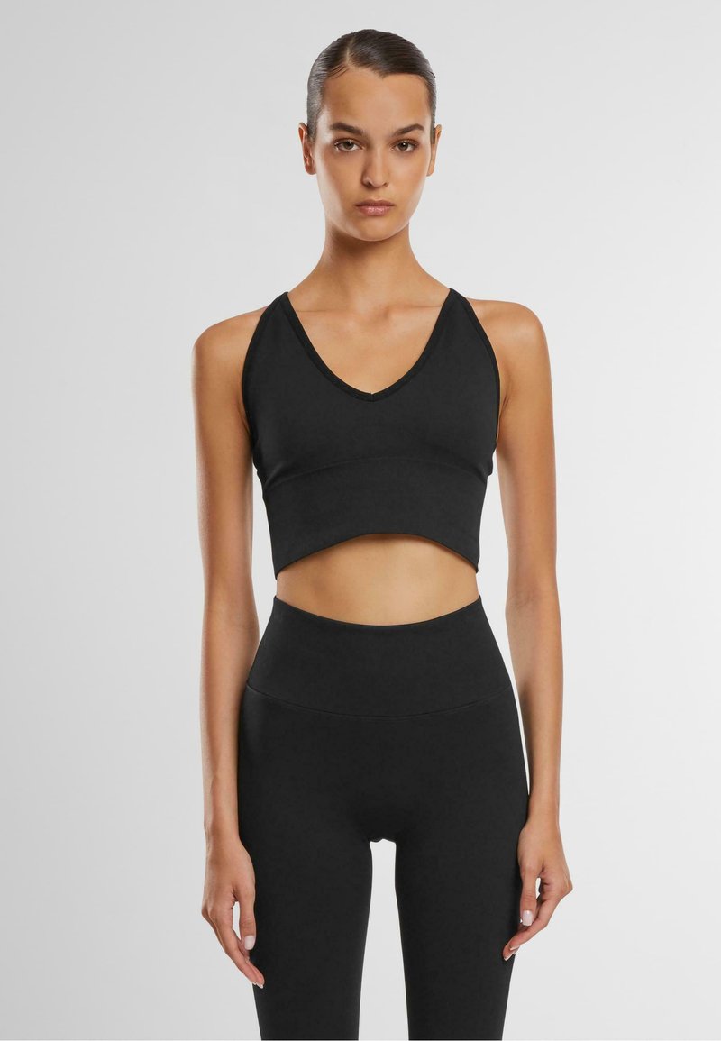 aim’n® SEAMLESS CROSS BACK BRALETTE - Sport-BH mit leichter Stützkraft ...