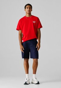 Red Bull Racing x Pepe Jeans Cargo trousers - navy/dark blue - Zalando