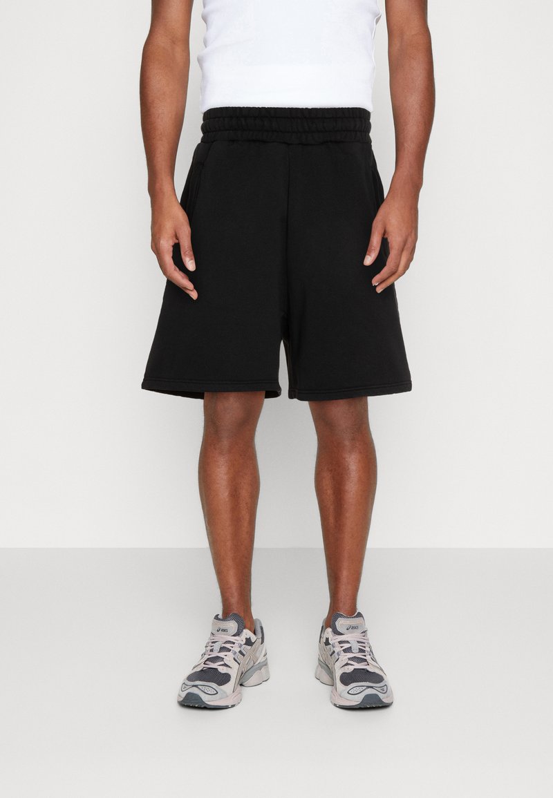 LOW LIGHTS STUDIOS® UNISEX - Tracksuit bottoms - black - Zalando.de