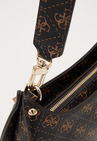 Guess MERIDIAN MINI TOP ZIP - Handbag - brown logo/brown - Zalando.co.uk