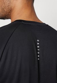 Castore TEE - T-Shirt basic - black/schwarz - Zalando.de