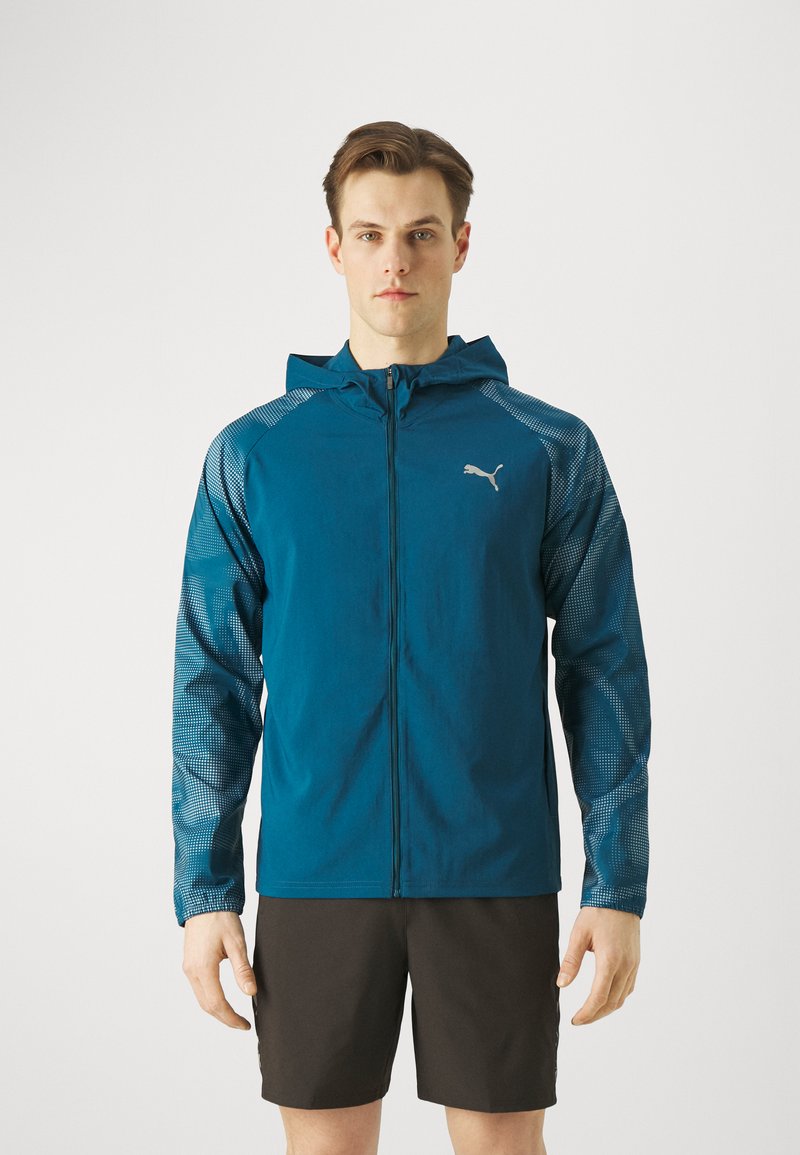 Puma RUN FAVORITE JACKET - Running jacket - ocean tropic/blue - Zalando.ie