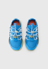 adidas Terrex VOYAGER 21 HEAT TRAVEL UNISEX - Terepfutó cipők - semi ...