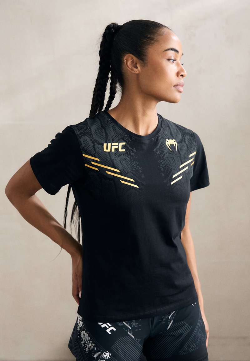 Venum UFC REPLICA WOMENS SHORT SLEEVE CHAMPION - Tricou cu imprimeu ...